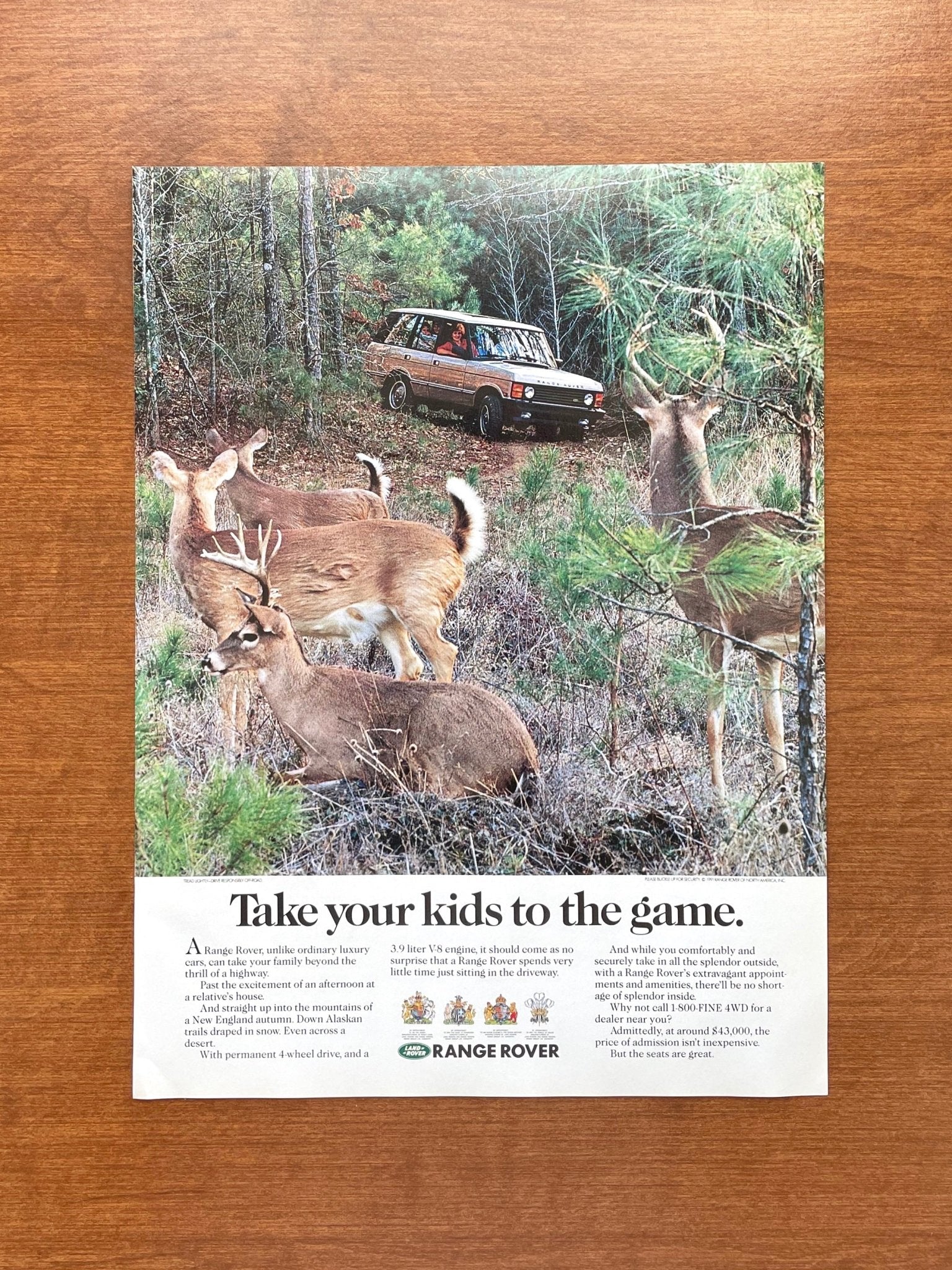 1991 Range Rover "Take your kids to the game." Advertisement | Ad Patina